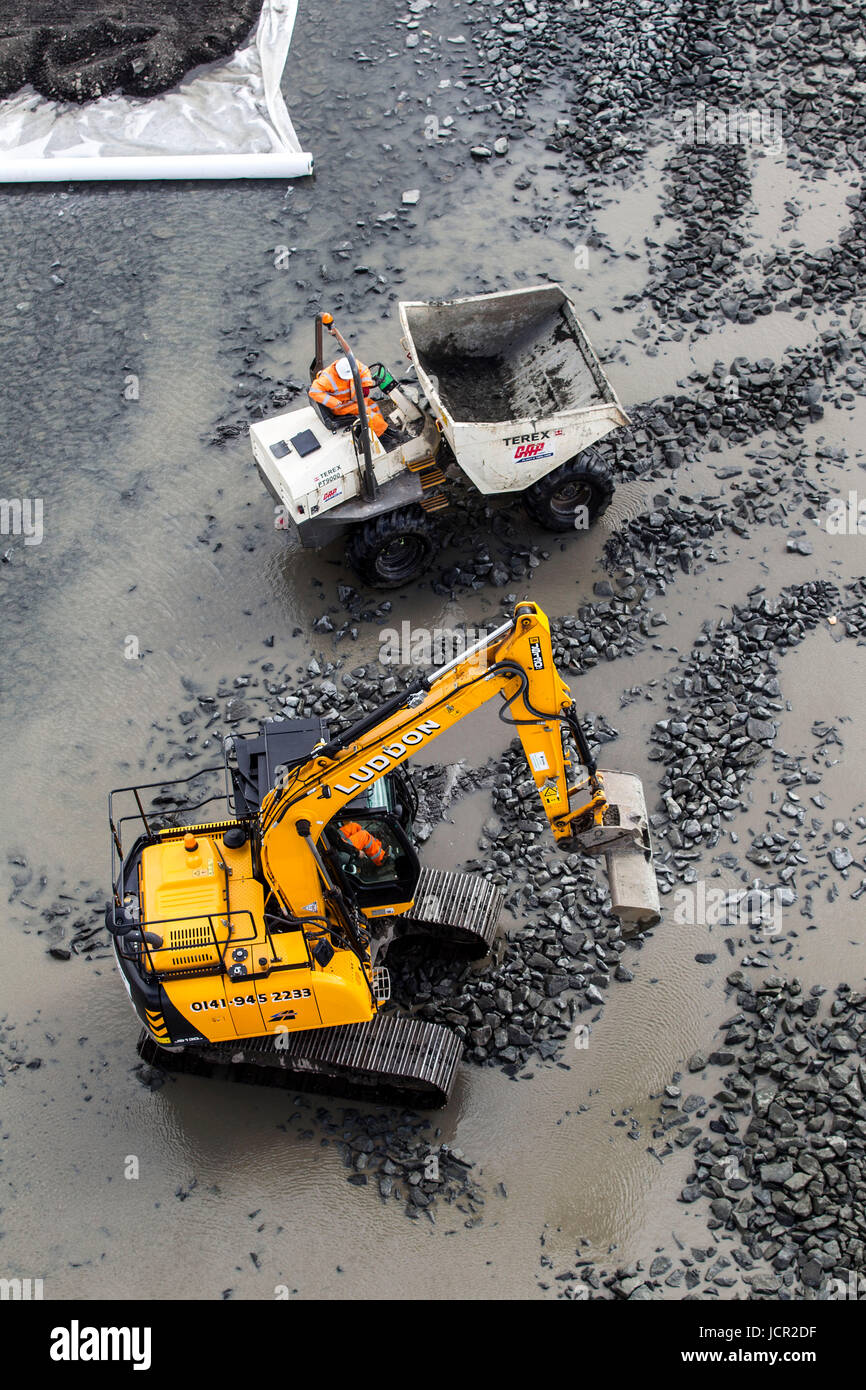 Digger and dumper truck aerial view Stock Photo - Alamy