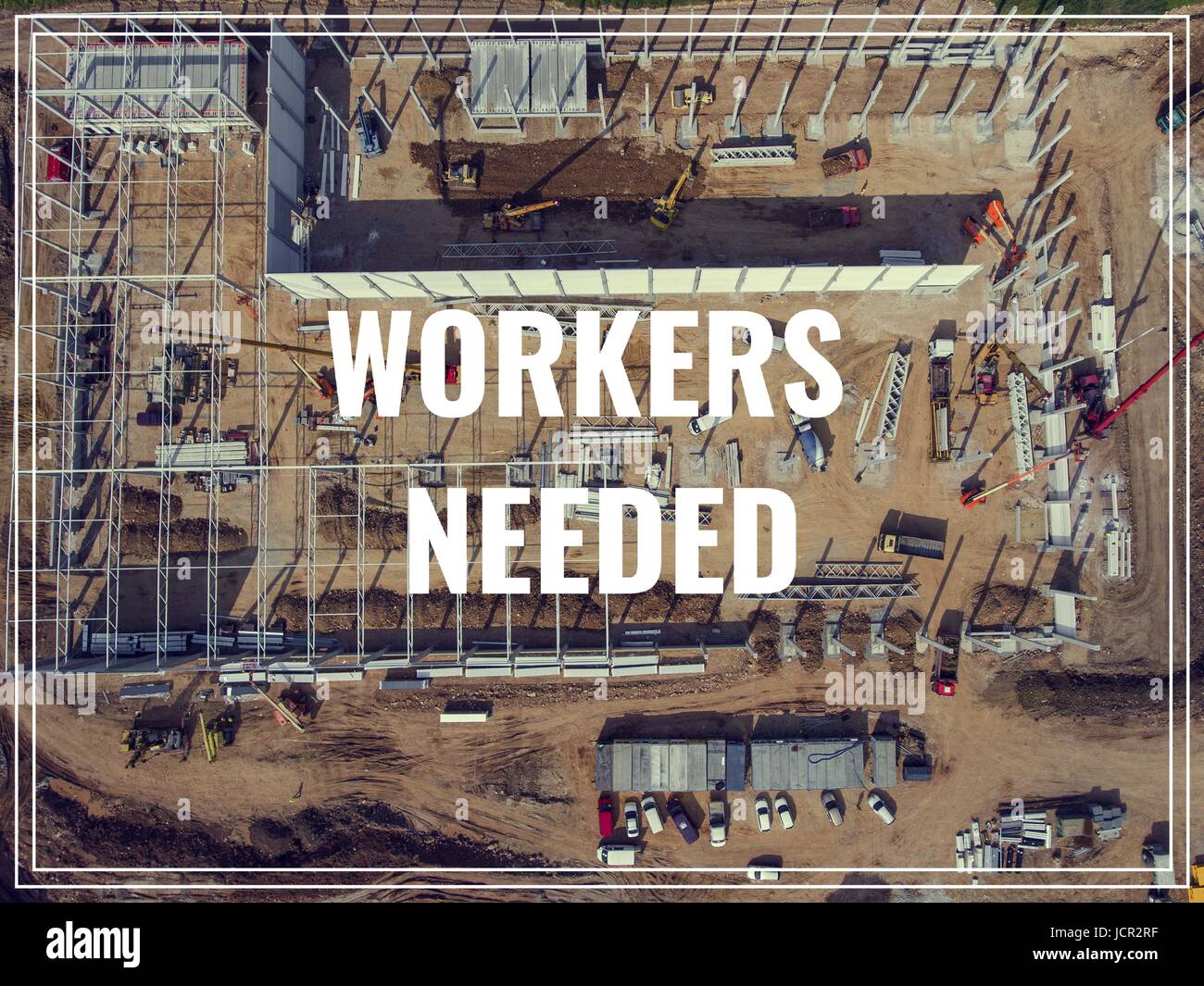 Word Workers Needed over industrial place from above Stock Photo - Alamy