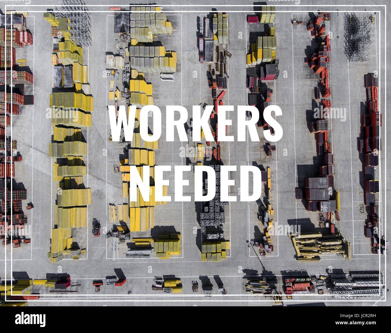 Word Workers Needed over industrial place from above Stock Photo - Alamy