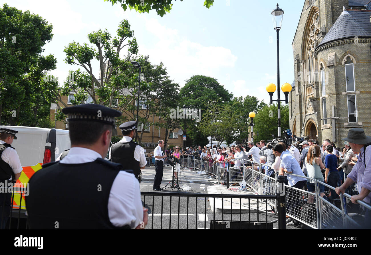Metropolitan Police Commander Stuart Cundy (centre) speaking to the ...