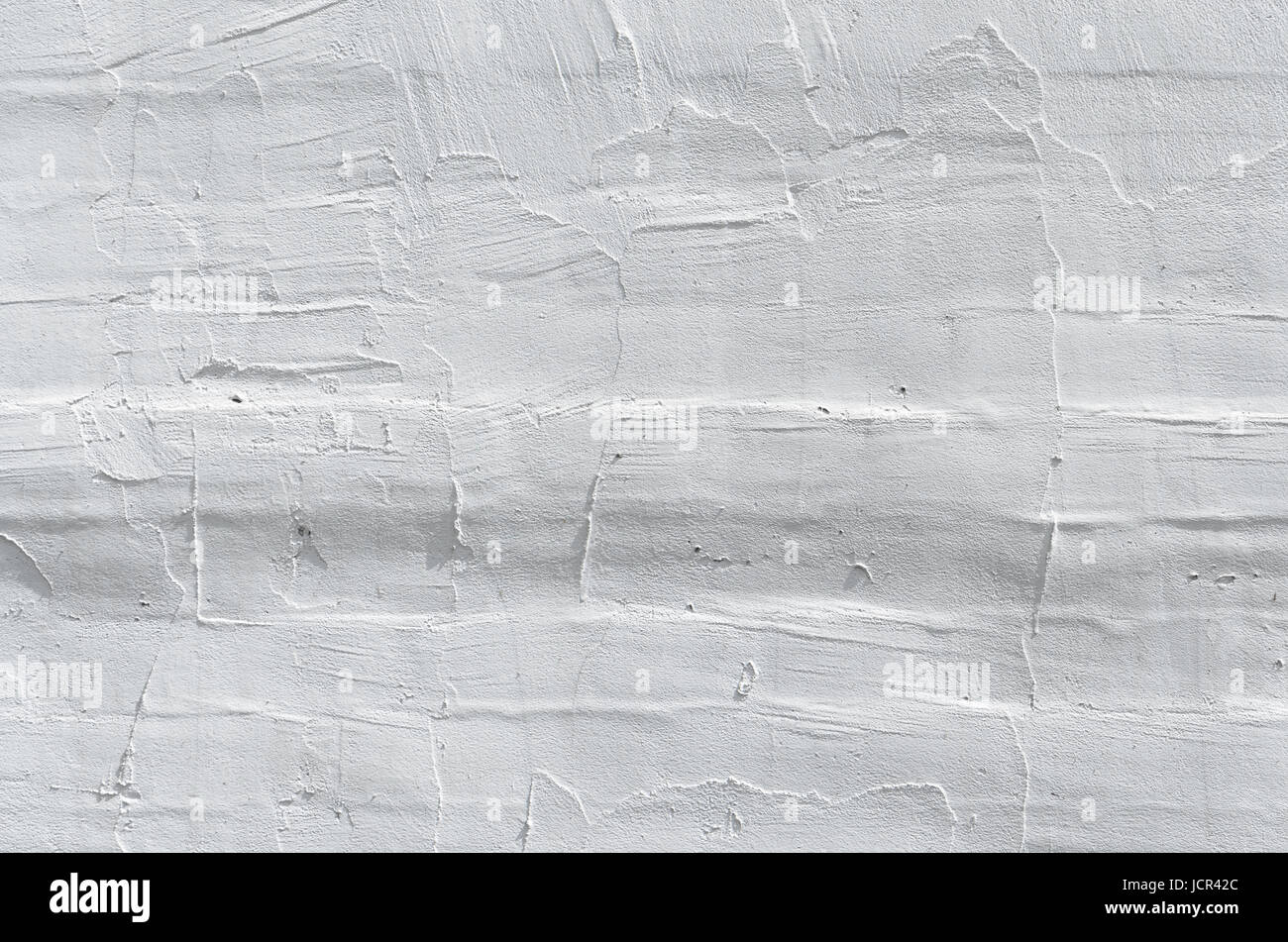Thin layer of plaster on a brick wall. White plaster wall texture ...