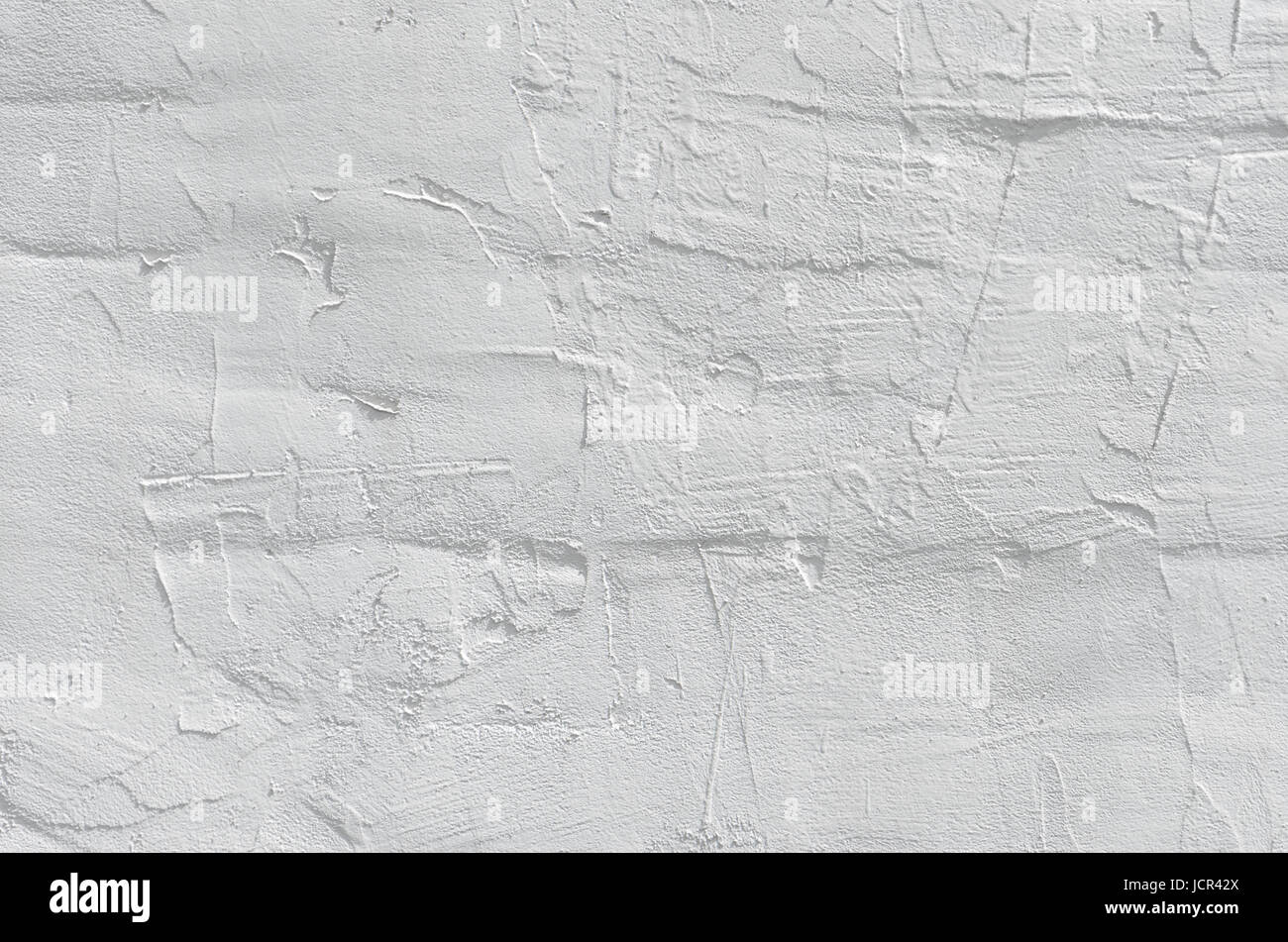 Thin layer of plaster on a brick wall. Gray plaster wall texture. Empty ...