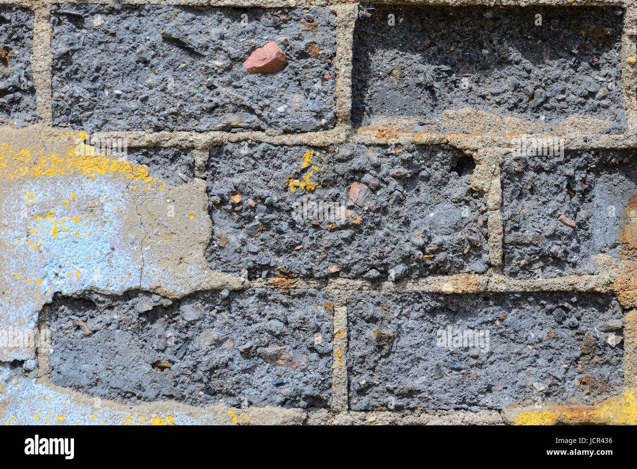 Grey brick wall texture with broken plaster Stock Photo - Alamy
