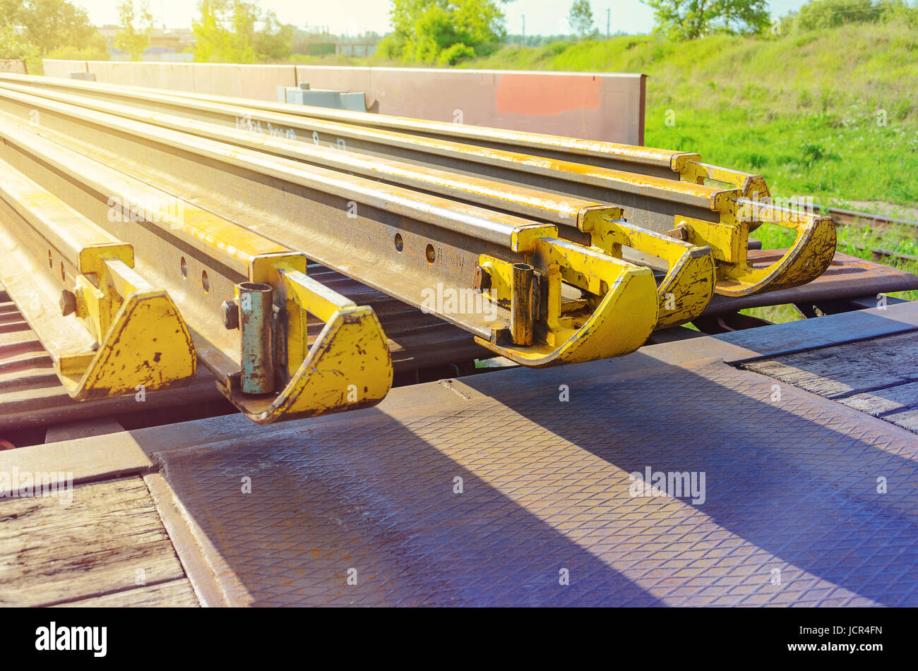 Railhead elements. Transportation of long new rails on a freight car ...