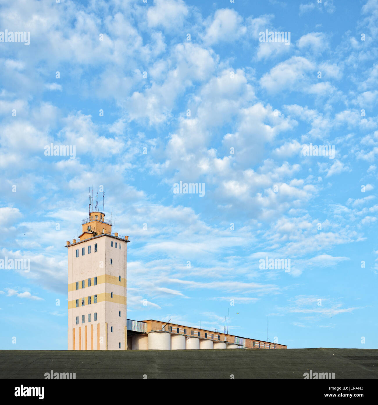 Plant for the production of baked goods with blue sky background ...