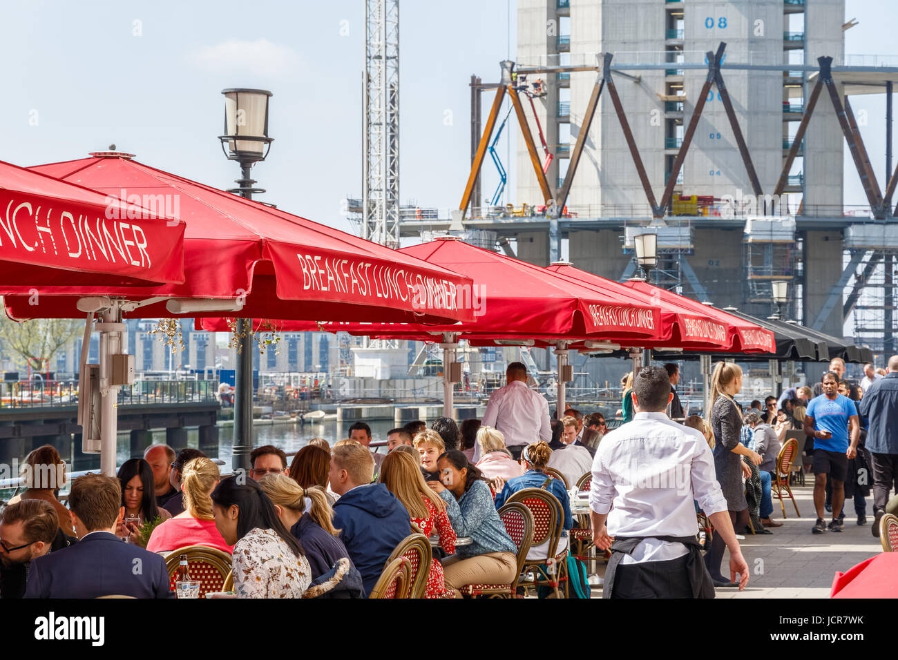 London, UK - May 10, 2017 - Dockside restaurant in Canary Wharf packed ...