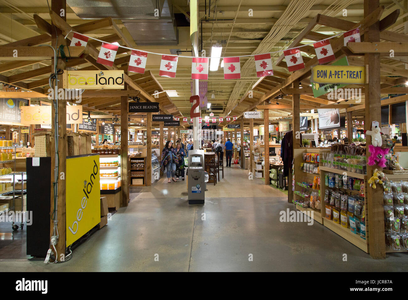 Canadian flags fly at Calgary Farmers' Market in Calgary, Canada. The ...