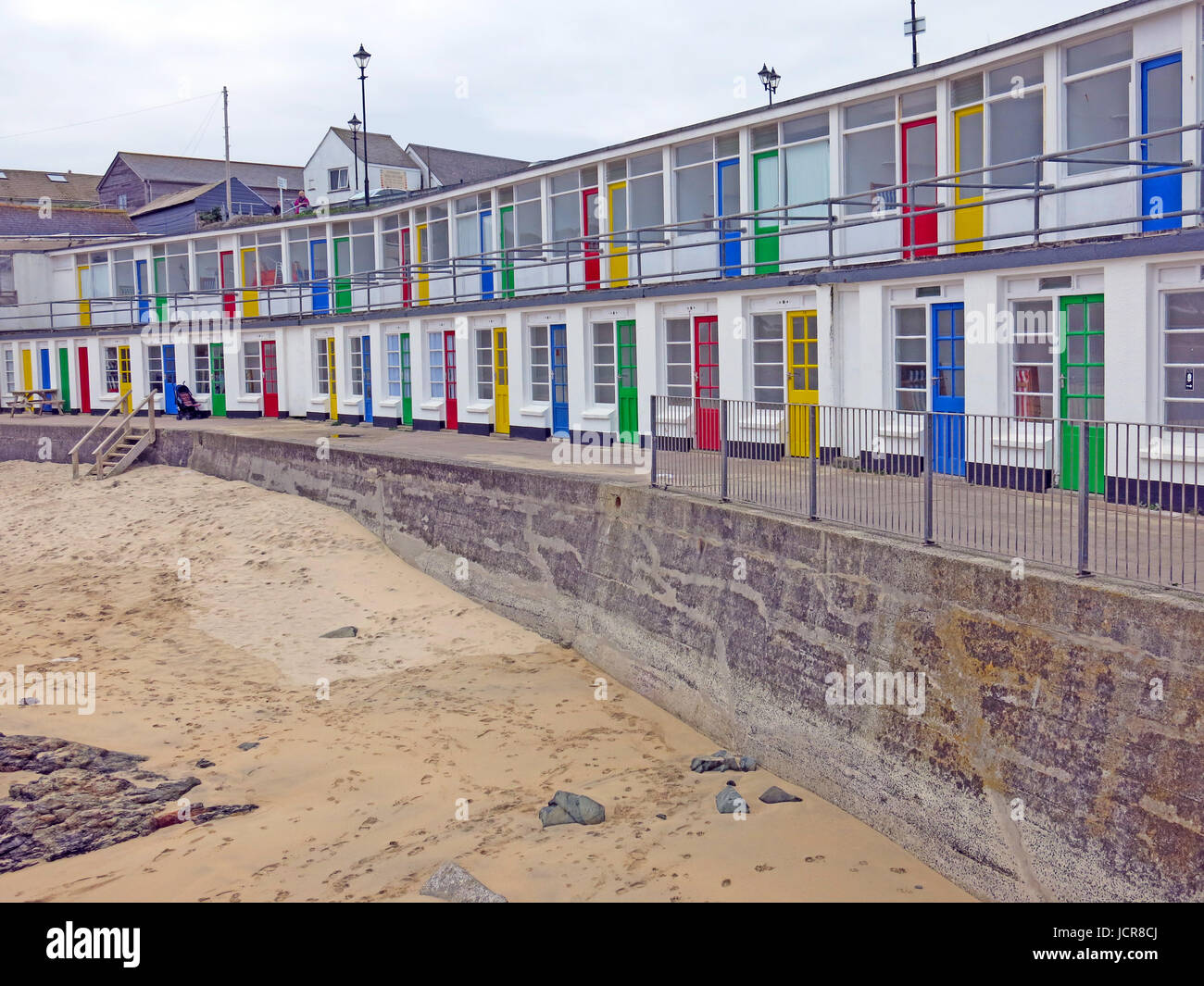 A double decker collection of colourful beach huts at Porthgwidden ...