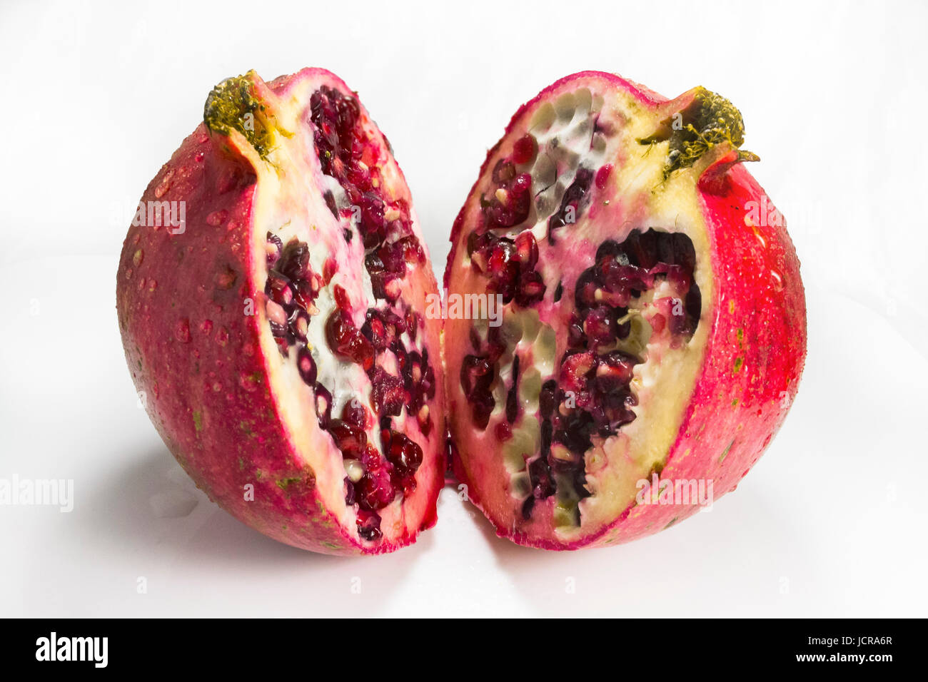 Split pomegranate hi-res stock photography and images - Alamy