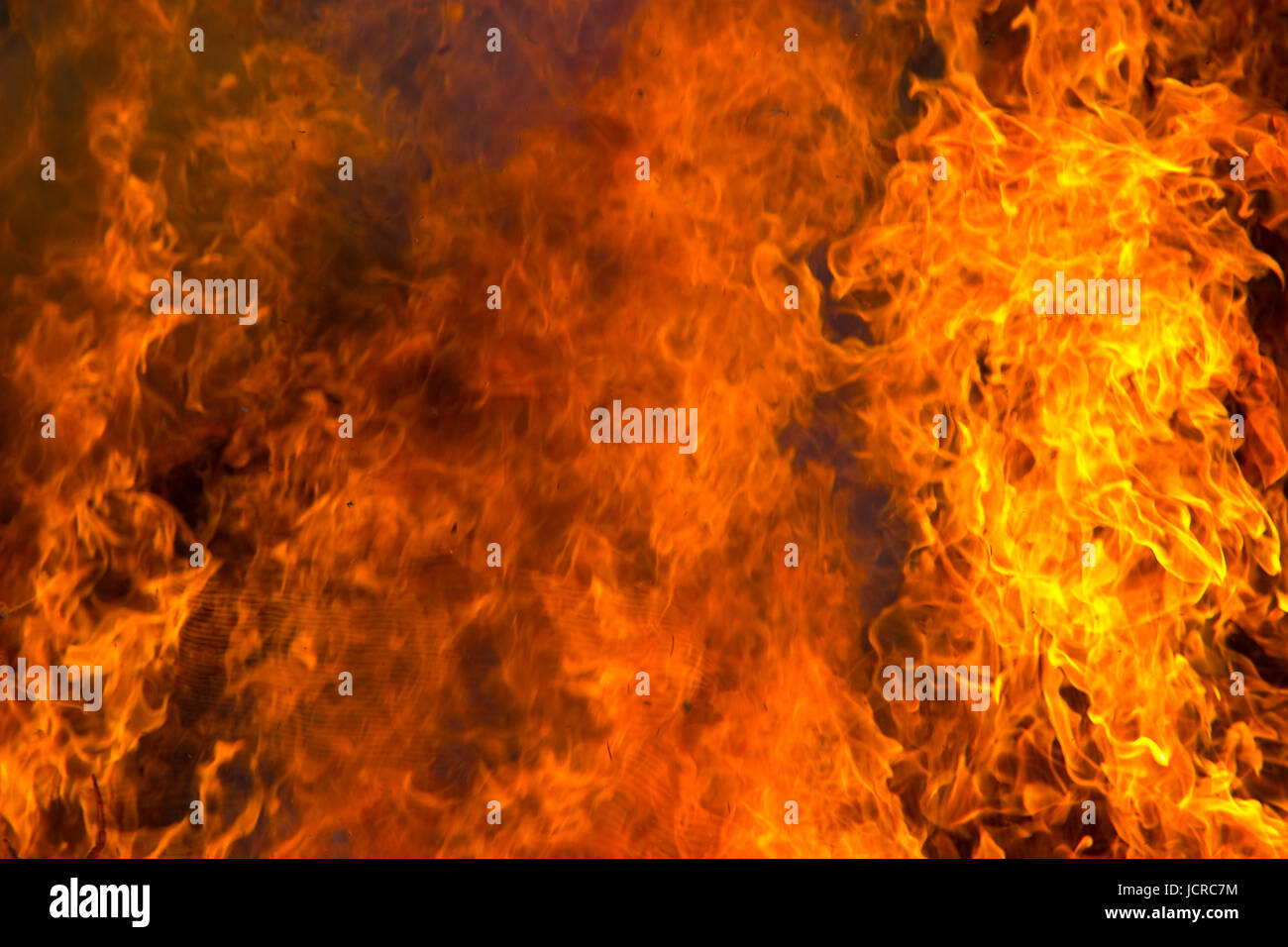 Outdoor burning fire and open flame. Black-orange background Stock ...