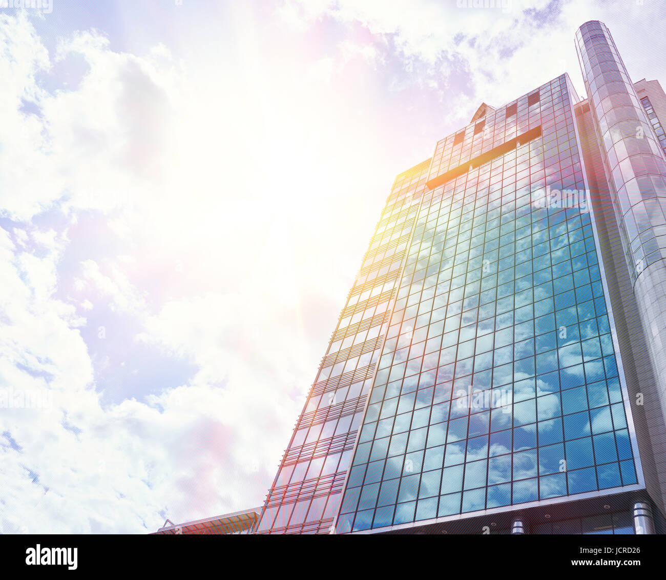 Perspective view of modern beautiful skyscraper made of glass shining ...