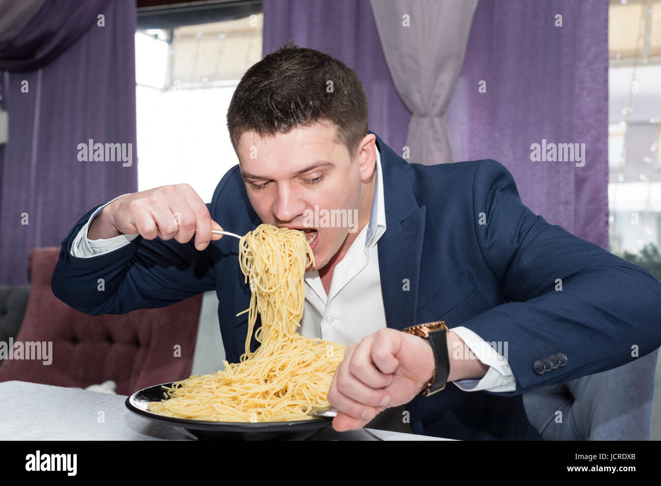 Man eating pasta vegetables not woman hi-res stock photography and ...