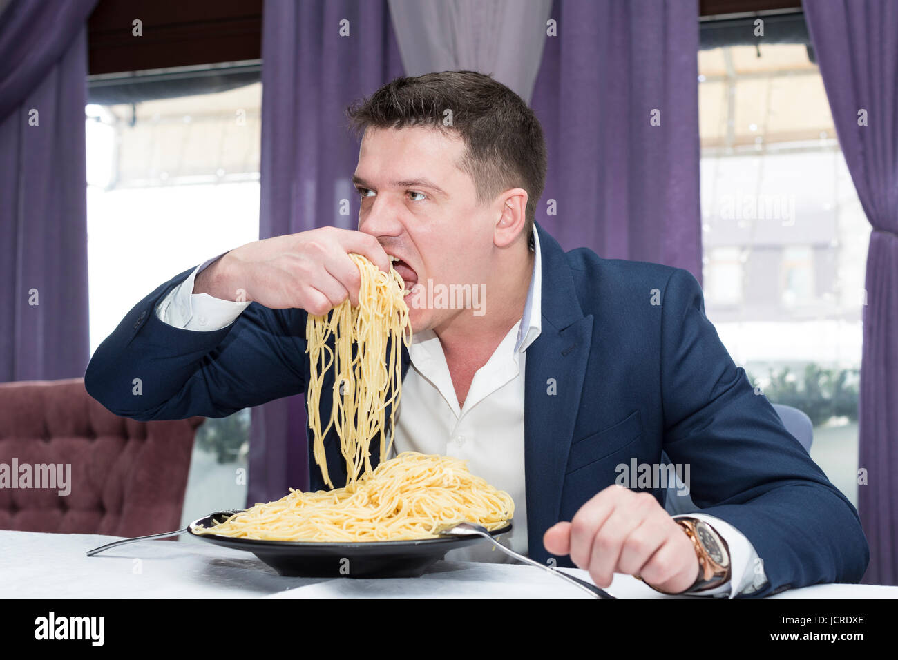 Man eating pasta vegetables not woman hi-res stock photography and ...