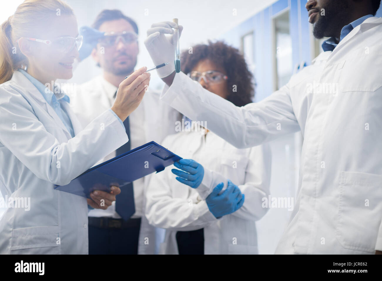 Group of scientists dna hi-res stock photography and images - Alamy