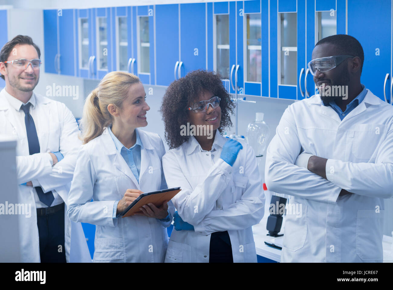 Research scientists making discovery in hi-res stock photography and ...