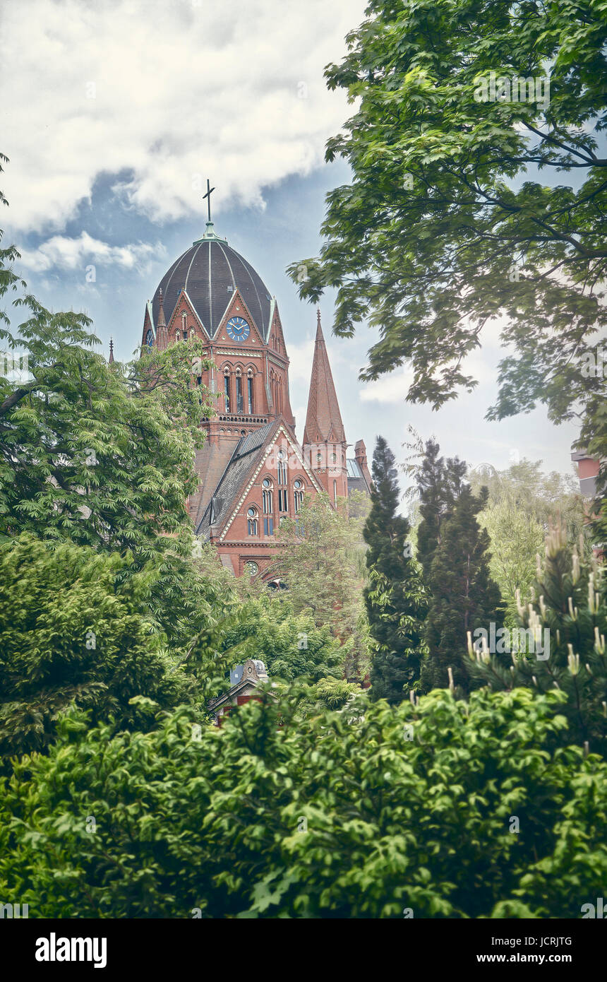 beautiful old church covered of trees Stock Photo - Alamy