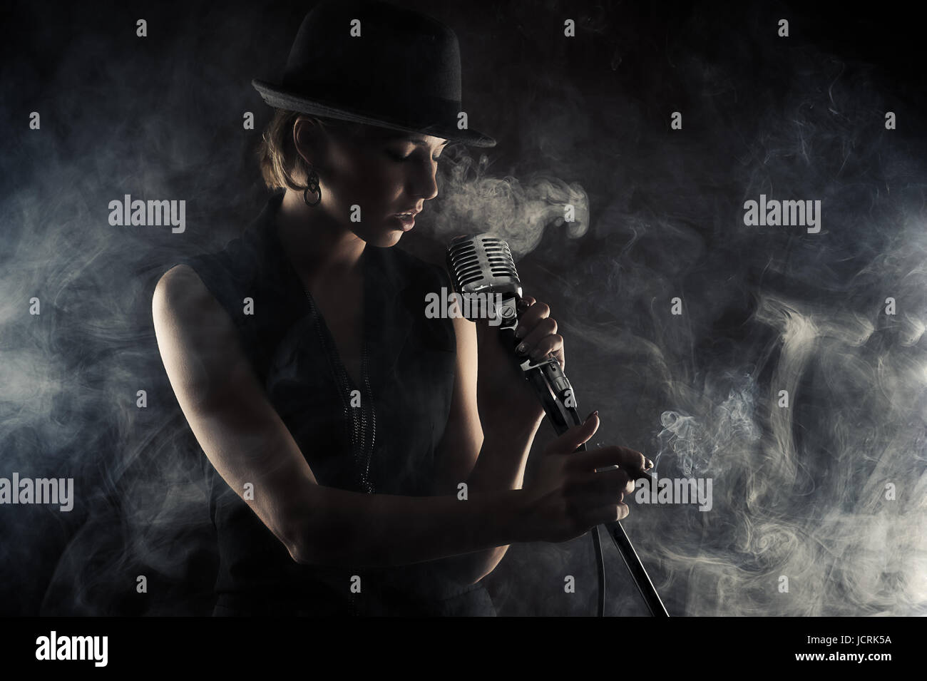 jazz singer woman with retro microphone Stock Photo - Alamy