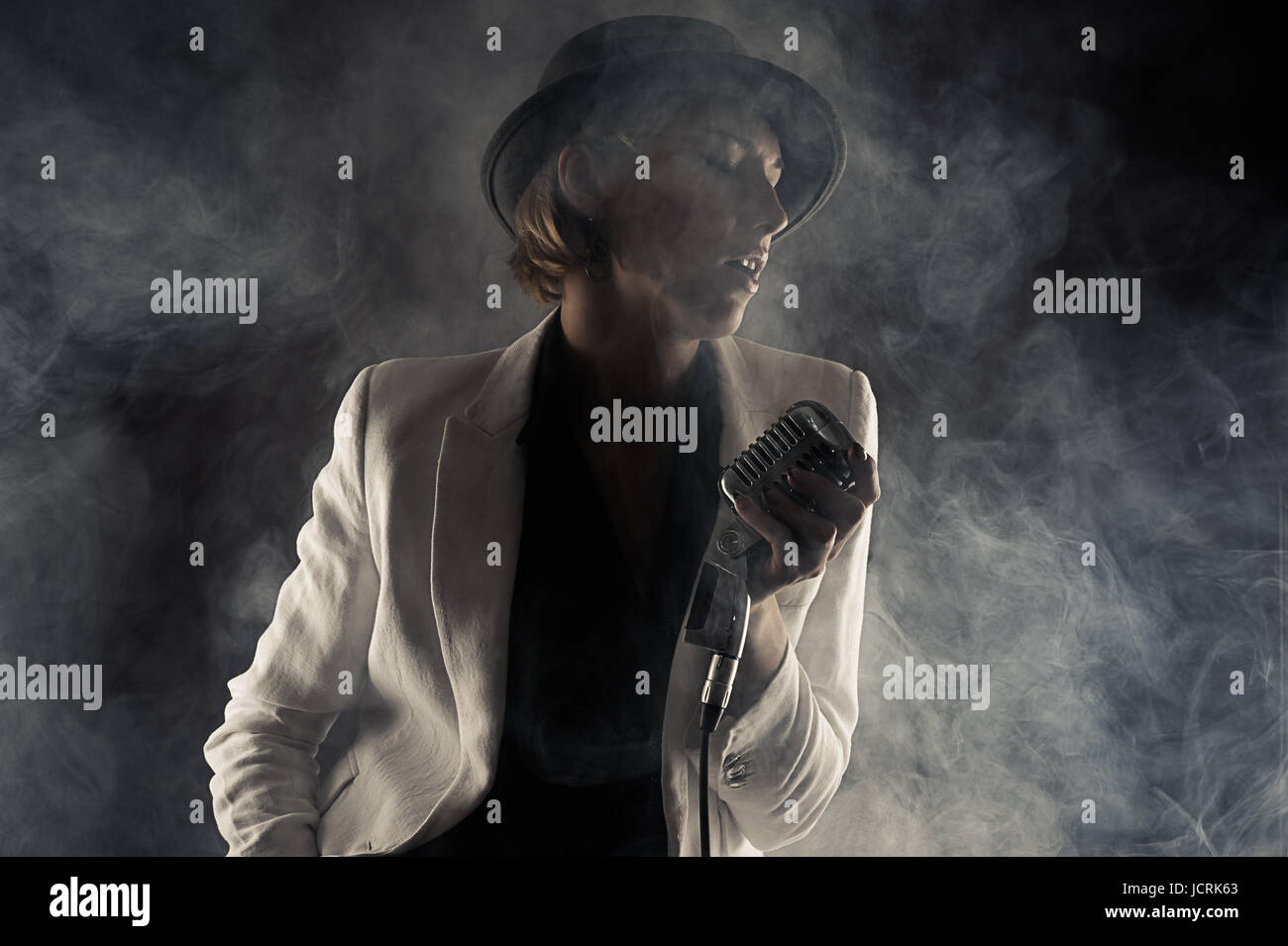 Woman singing vintage microphone studio hi-res stock photography and ...
