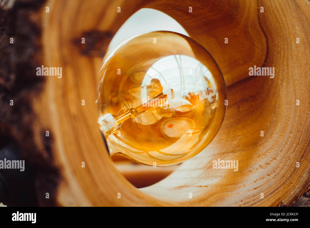 Old light bulb stuck in a wooden lamp Stock Photo - Alamy