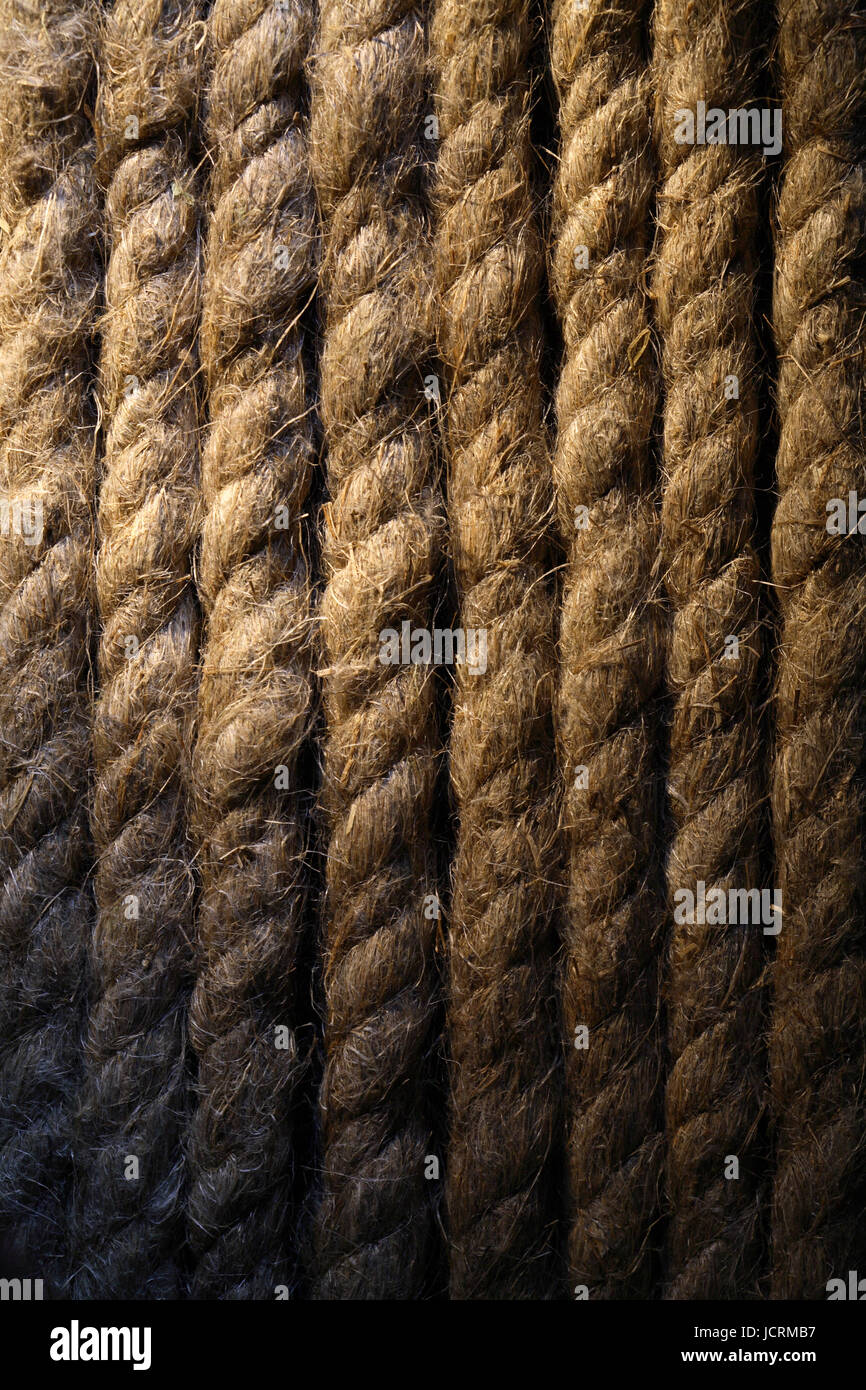 Extreme closeup of old rope background under beam of light Stock Photo ...