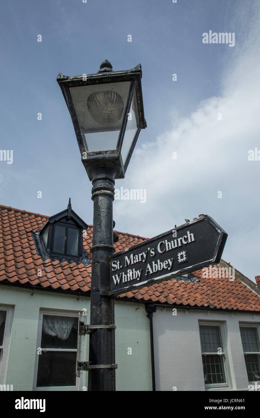 Old Street light and direction sign to Whitby Abbey and St Mary's ...