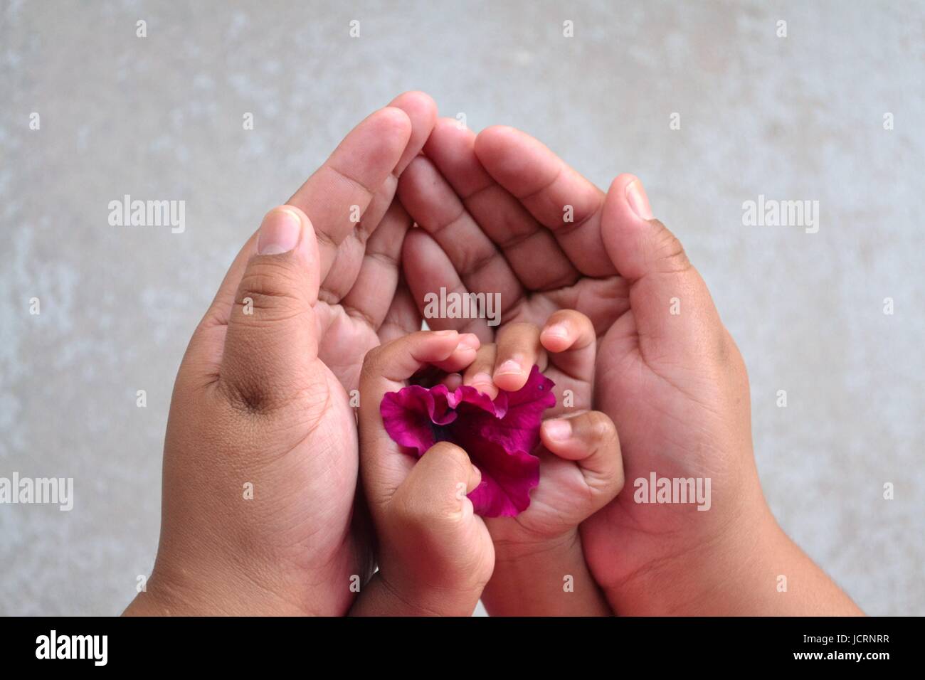 Clutching hands hi-res stock photography and images - Alamy