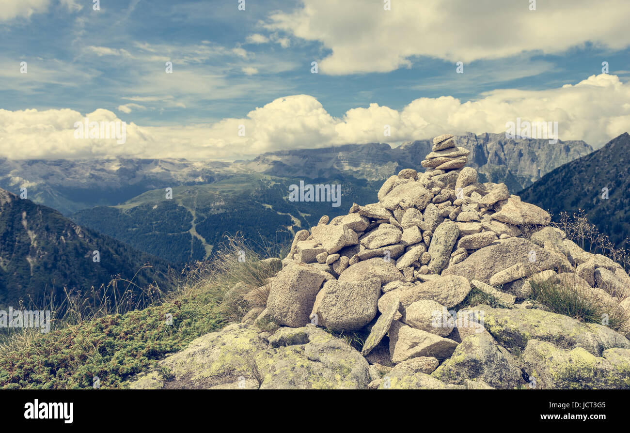 Mountain view with a stone pyramide Stock Photo - Alamy