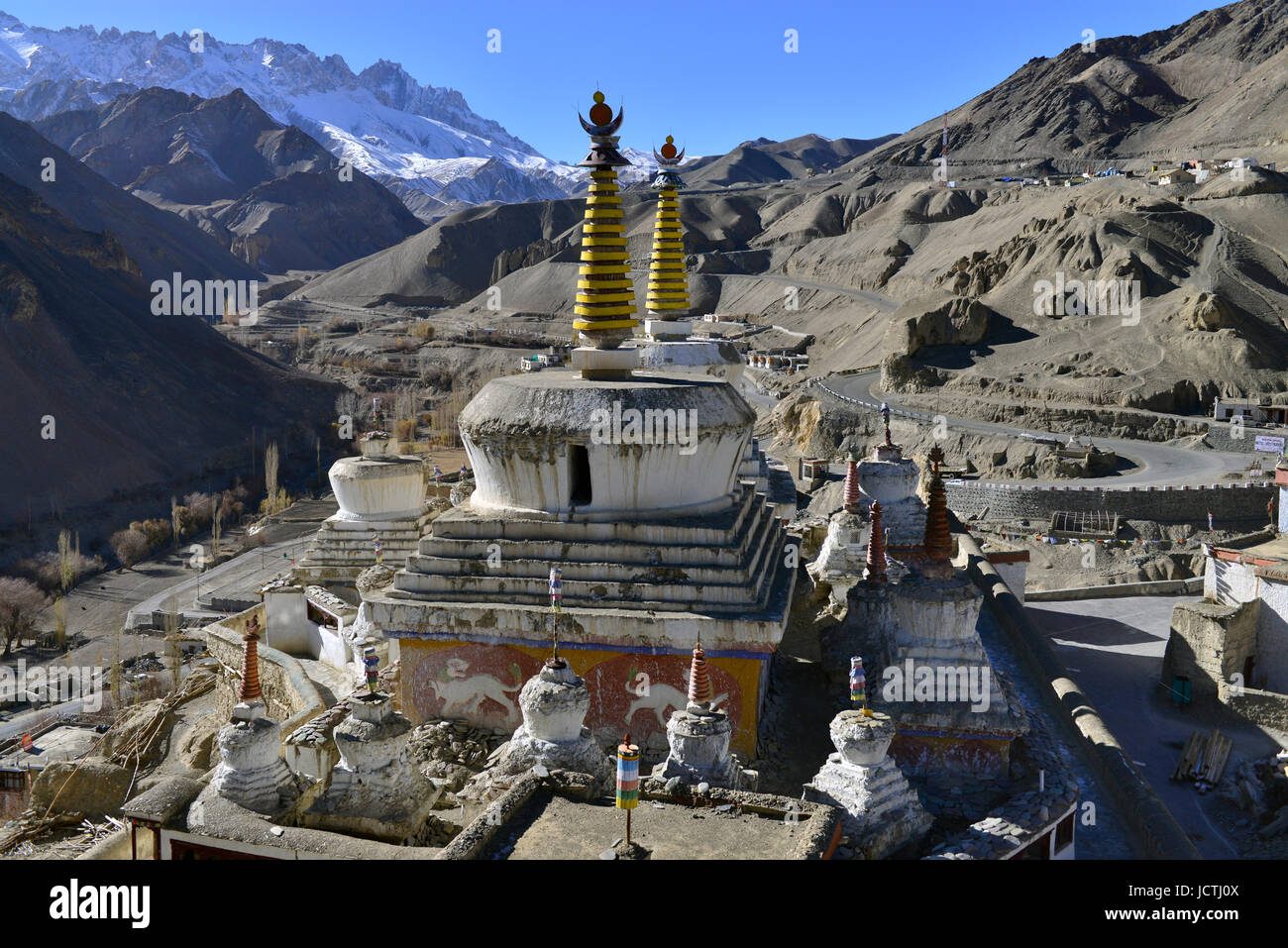 The huge ancient Tibetan white stupa inside the courtyard is a Buddhist ...