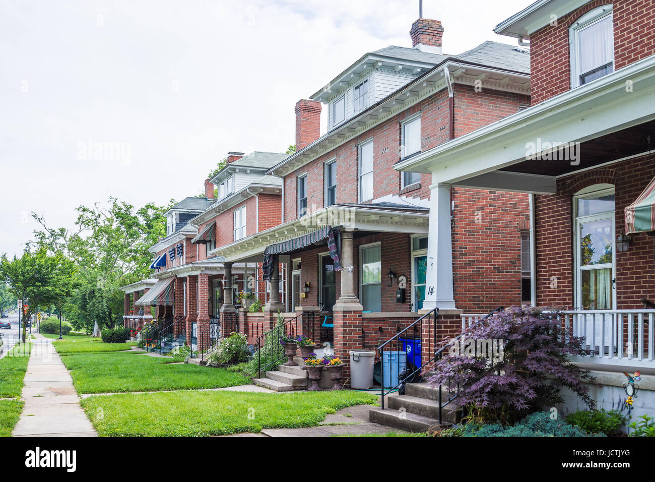 Frederick, USA - May 24, 2017: Residential row homes in downtown with ...