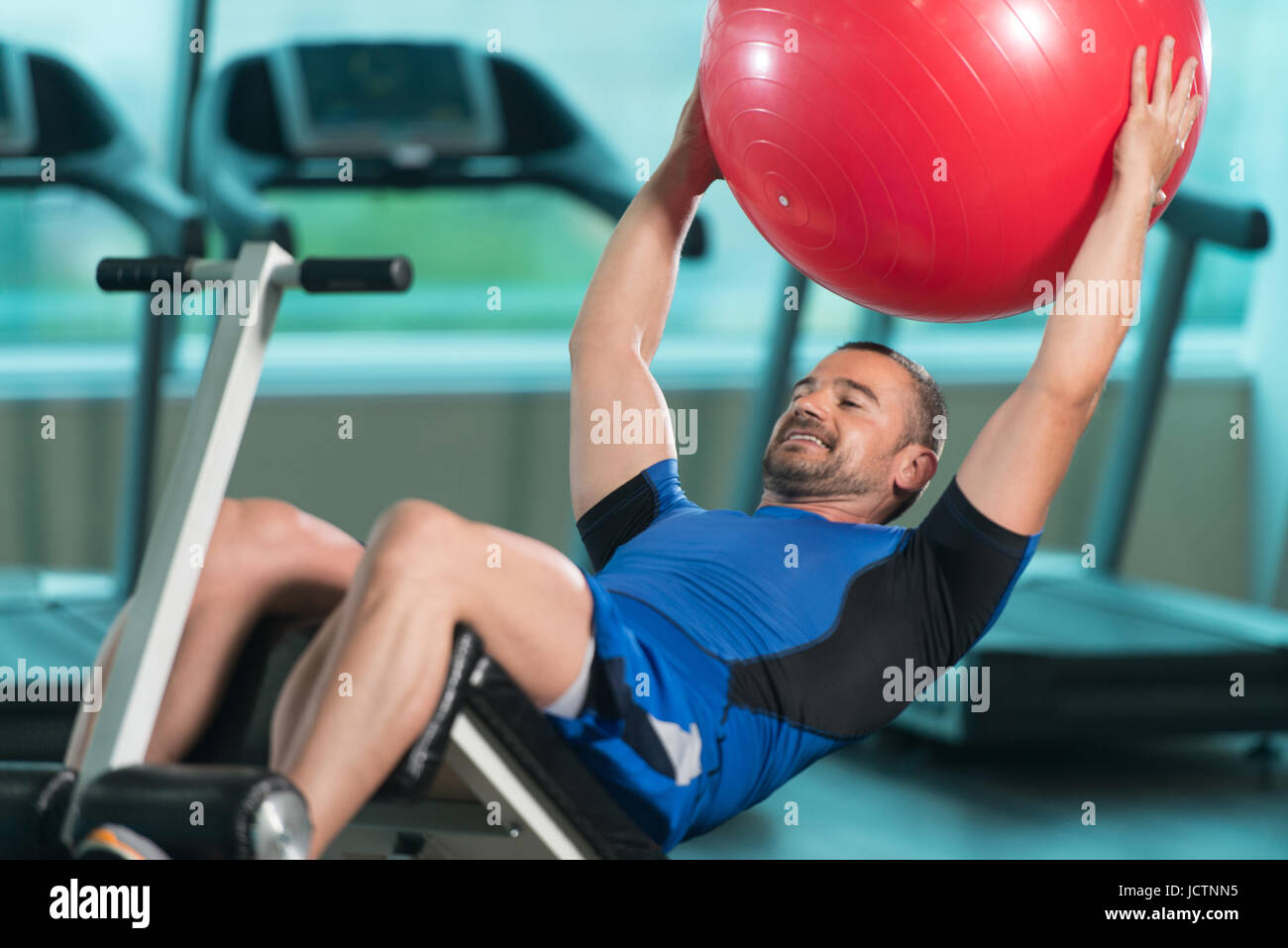 Male model posing on bench hi-res stock photography and images - Alamy