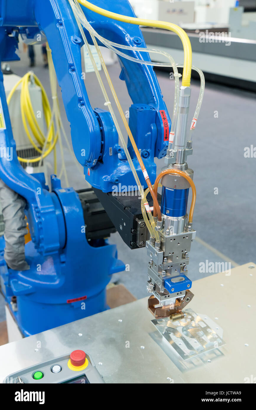 robotic hand machine tool at industrial manufacture factory Stock Photo ...