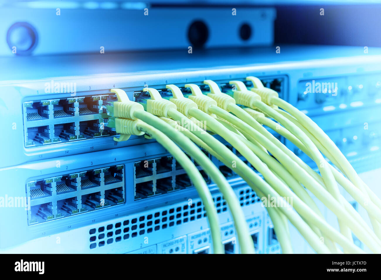 network cable connecting on network core switch close up Stock Photo ...