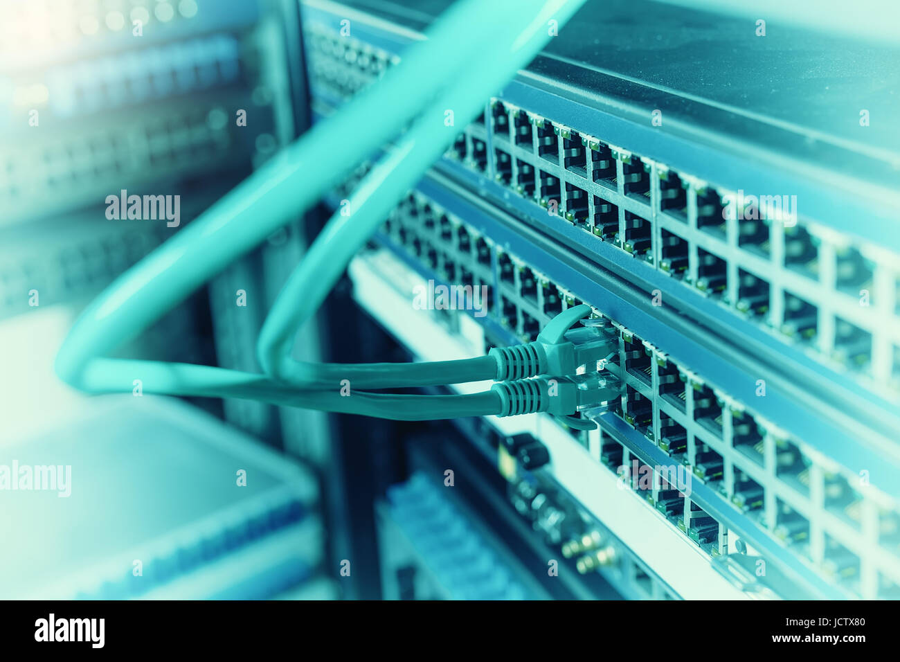 network cable connecting on network core switch close up Stock Photo ...