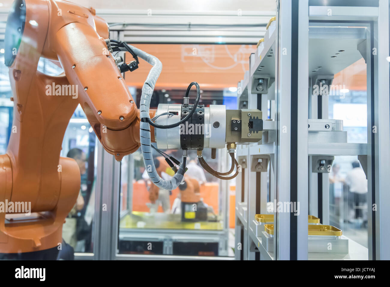 robotic hand machine tool at industrial manufacture factory Stock Photo ...
