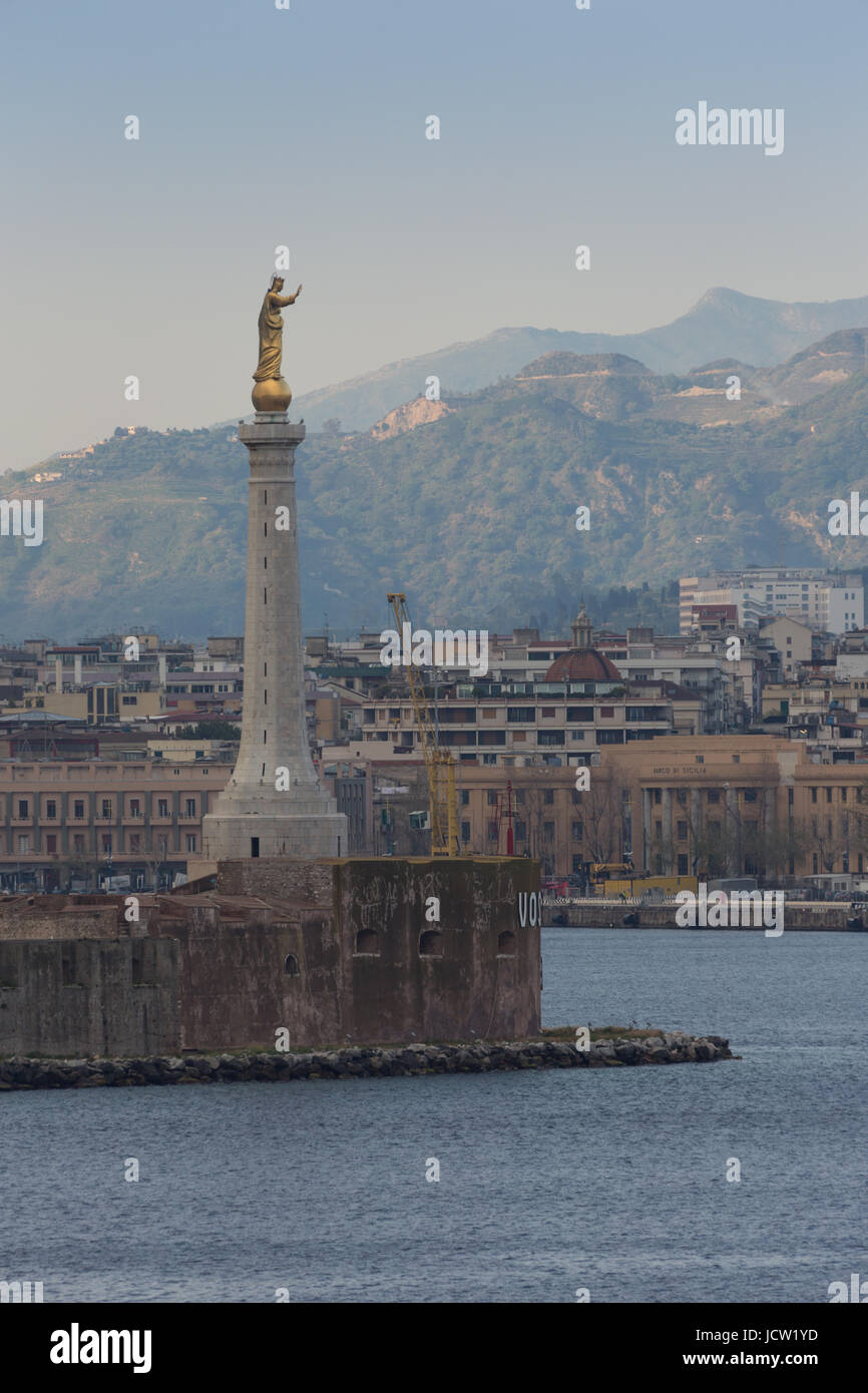 Golden statue of Our Lady Of The Letter (Madonna della Lettera) on top ...