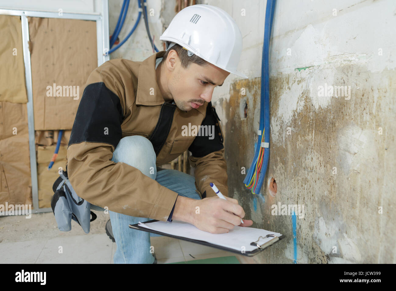 plumber with plumbing tools Stock Photo - Alamy