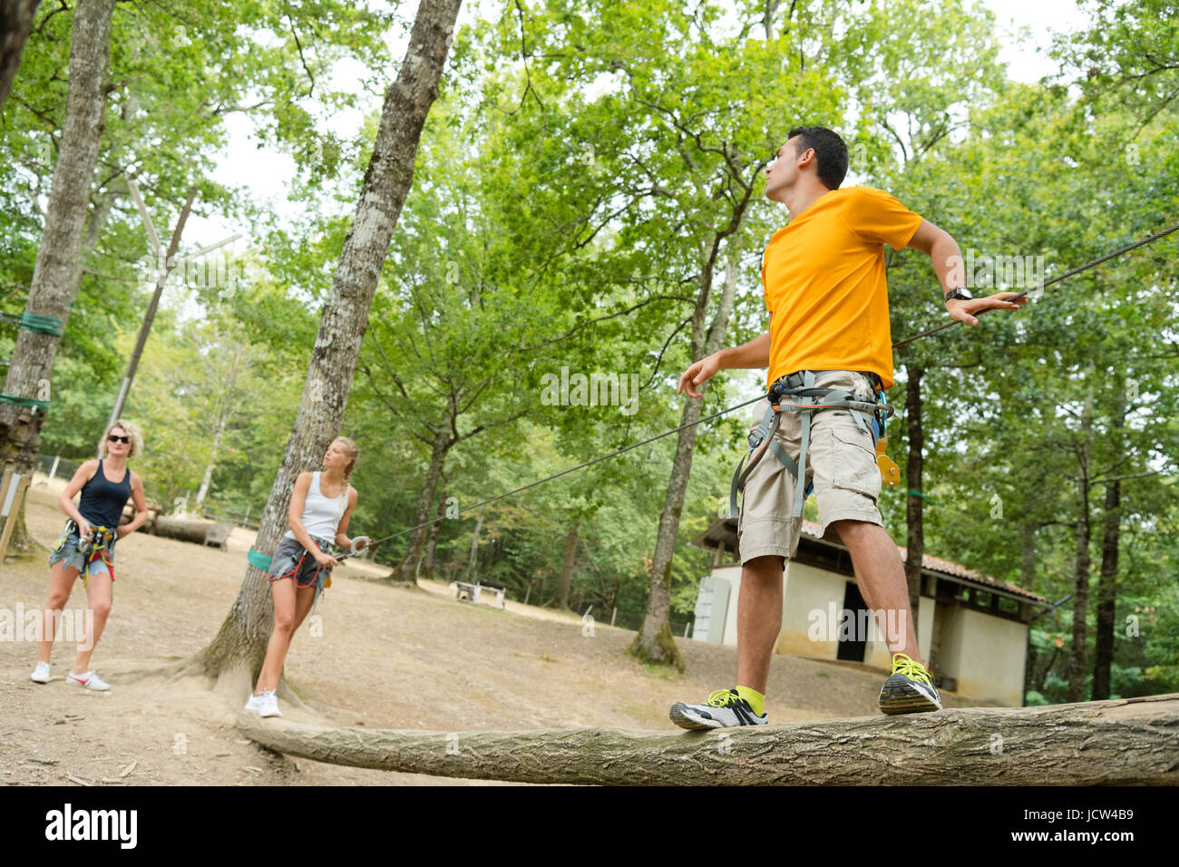 man and friends at the extreme rope park Stock Photo - Alamy