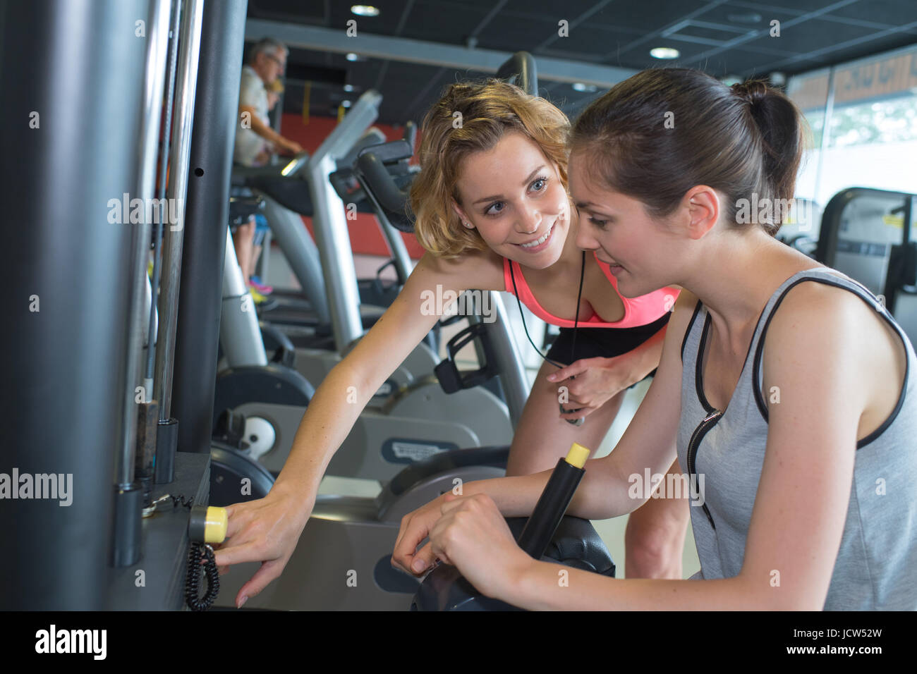 beautiful women in gym Stock Photo - Alamy