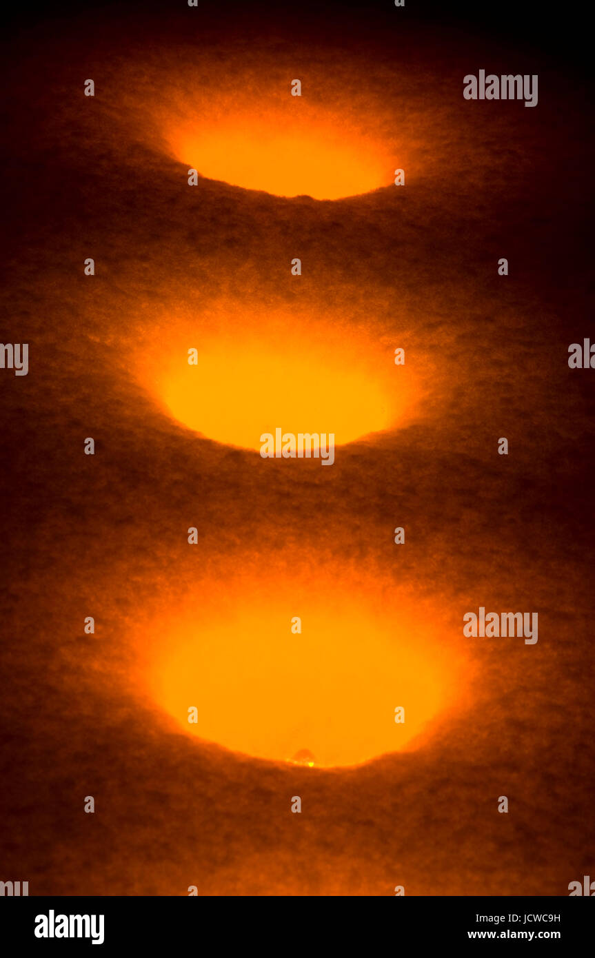 Golden lights in snow Stock Photo - Alamy