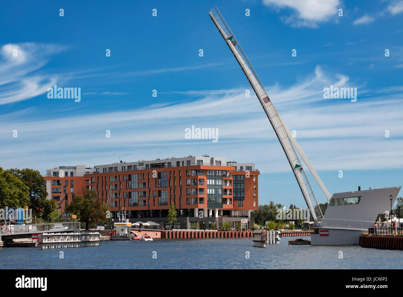 The new, modern footbridge, drawbridge, overpass in Gdansk, Danzig ...