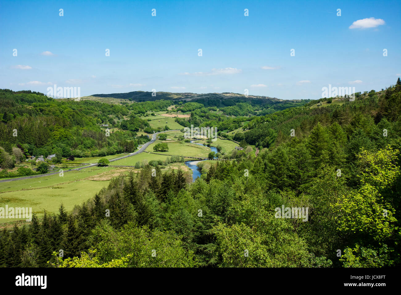 Afon Lledr winds its way through the lush scenic Lledr Valley in North ...