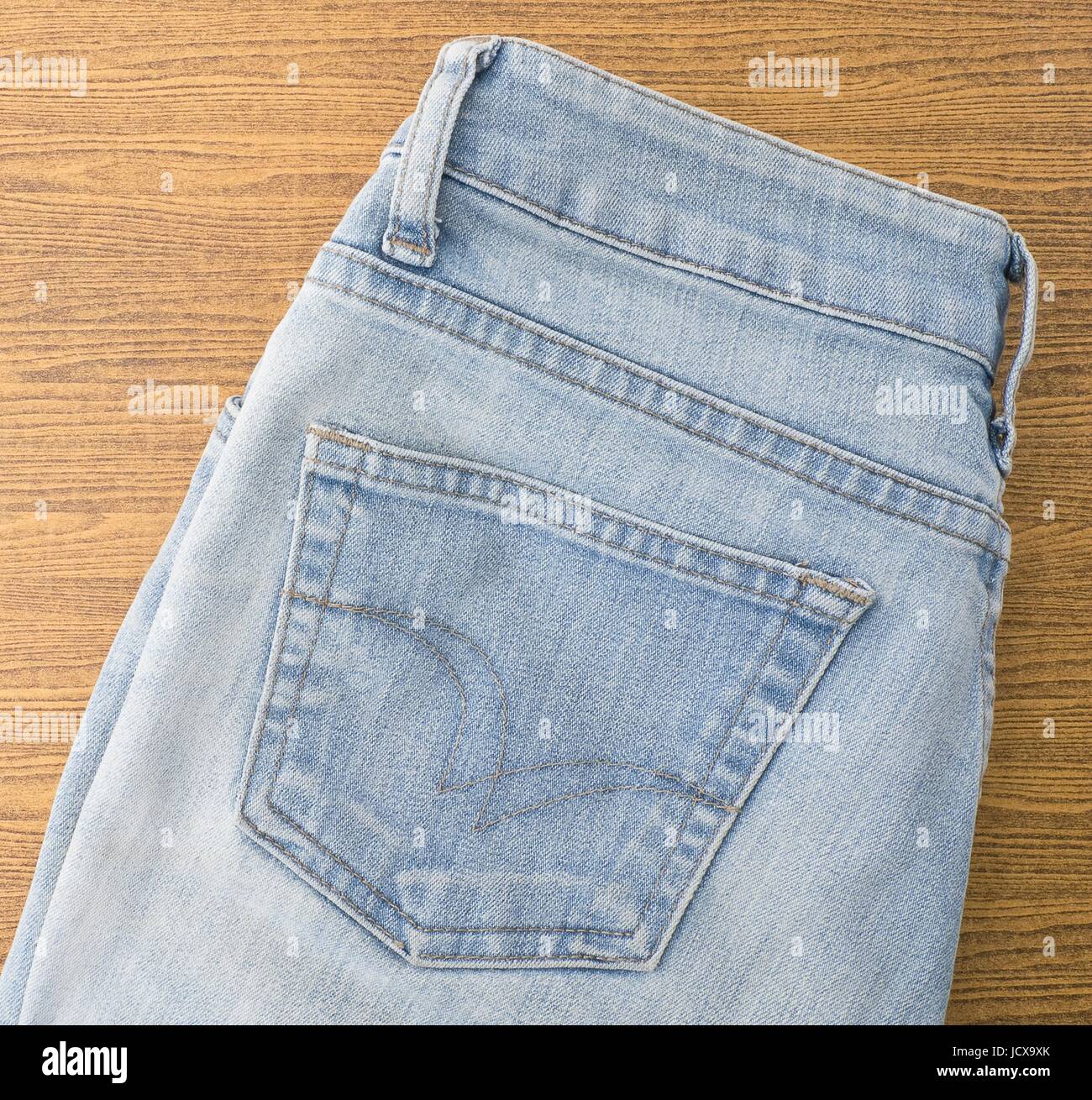 Fabric Texture, Close Up of Blue Denim Jean on A Wooden Background ...