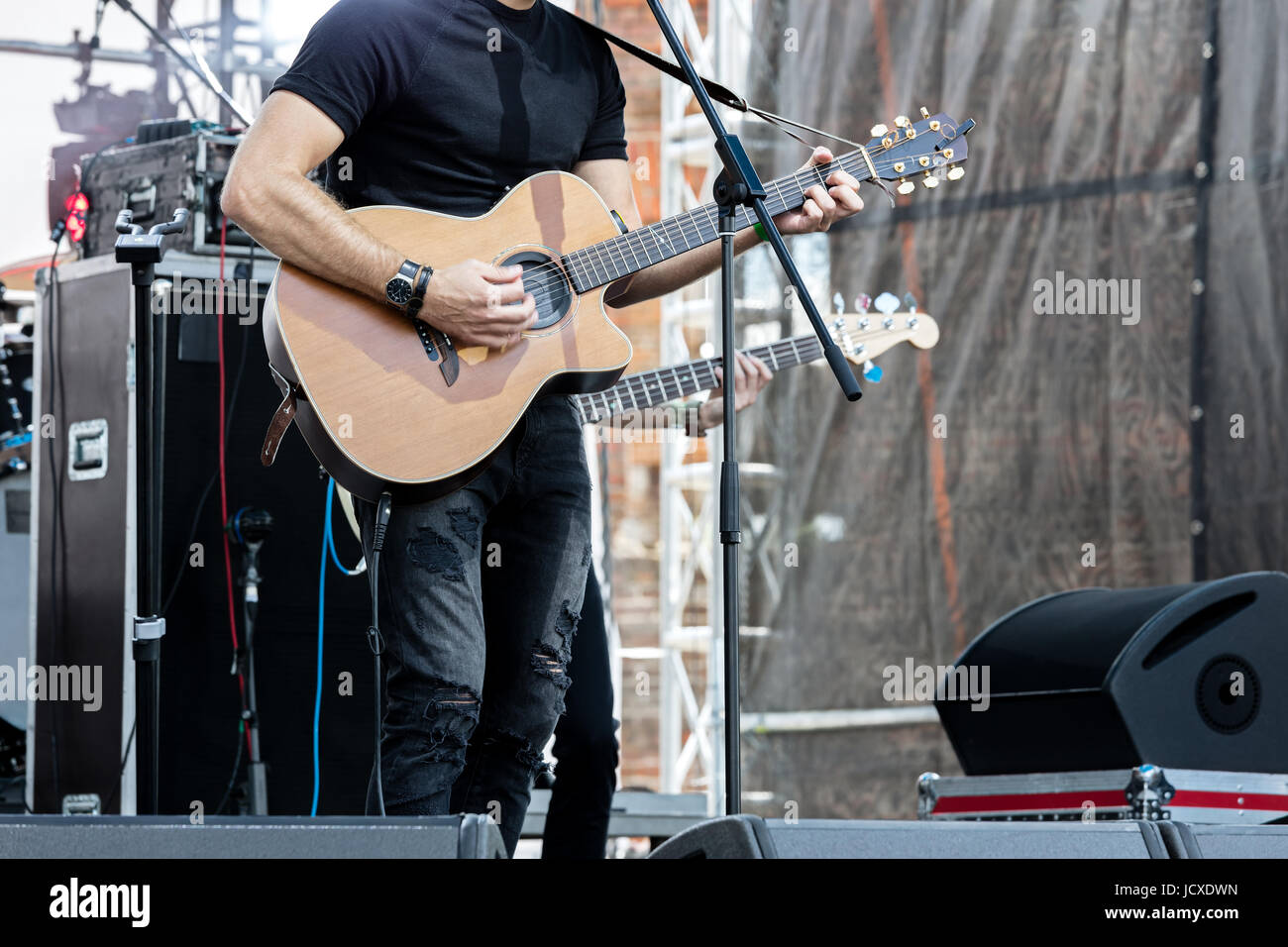 Acoustic Guitar Player On Stage
