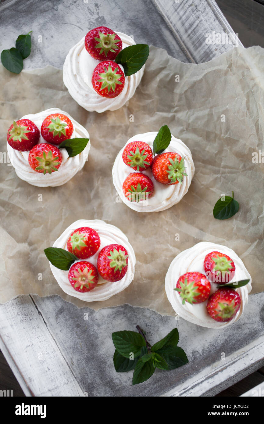 Mini pavlova with strawberries Stock Photo - Alamy