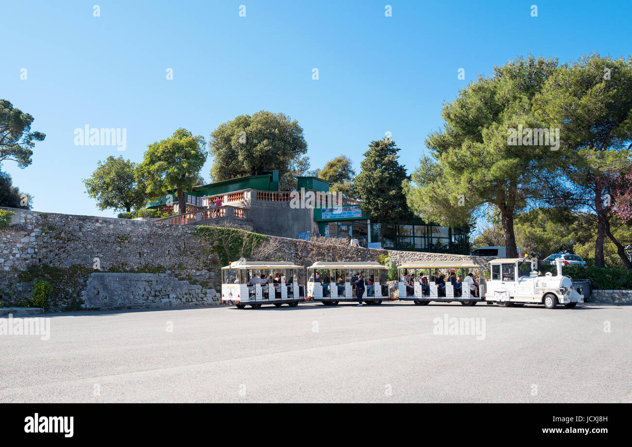 Nice, France - March 19, 2016: A little train for tourists in the top ...