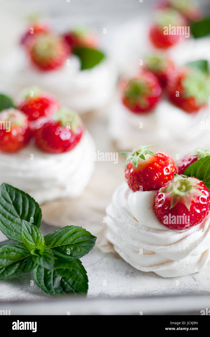 Mini pavlova with strawberries and mint Stock Photo - Alamy