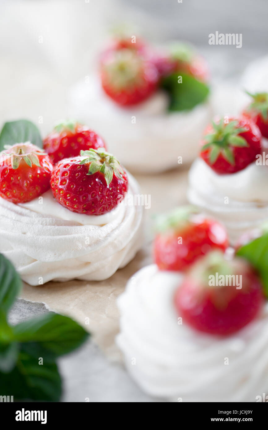 Mini pavlova with strawberries and mint Stock Photo - Alamy