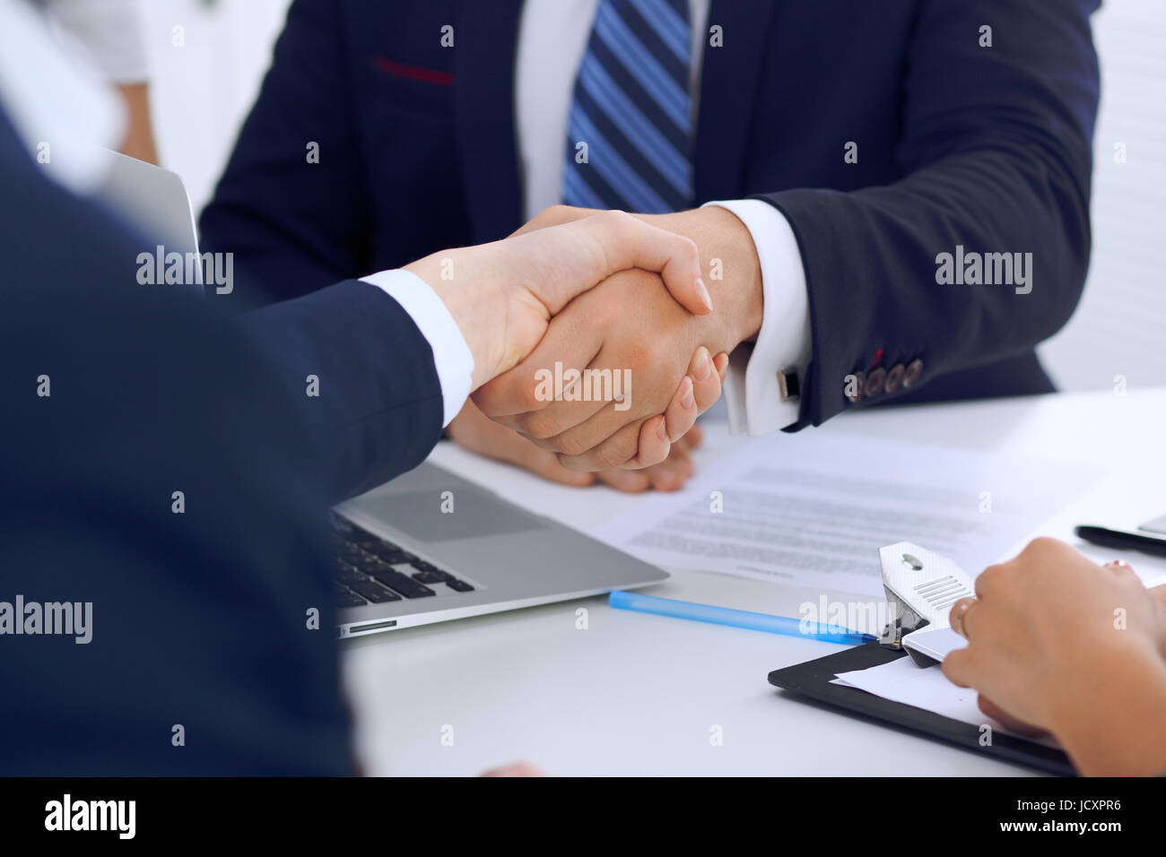 Business handshake at meeting or negotiation in the office. Partners ...