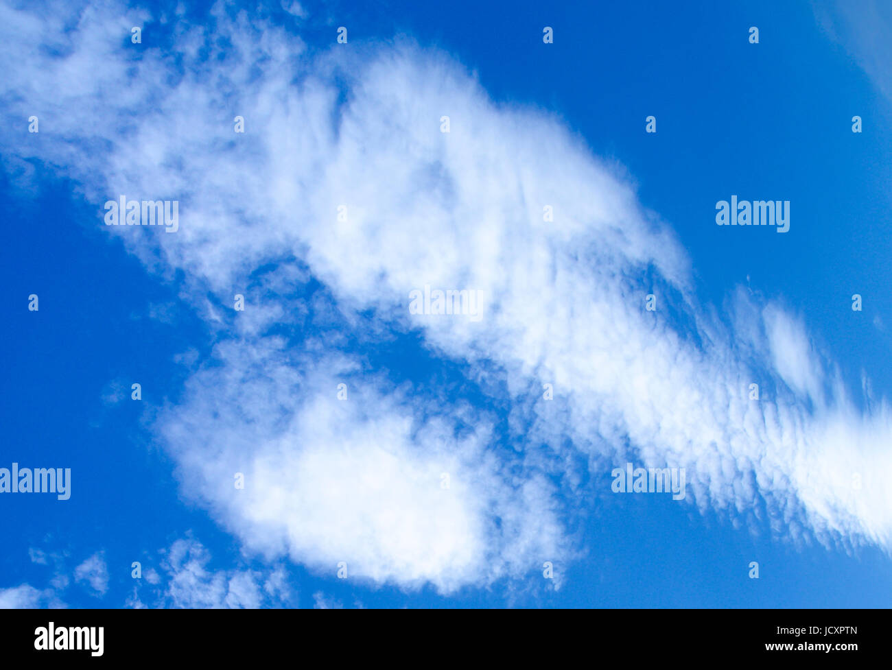 Blue sky with clouds looking up Stock Photo - Alamy