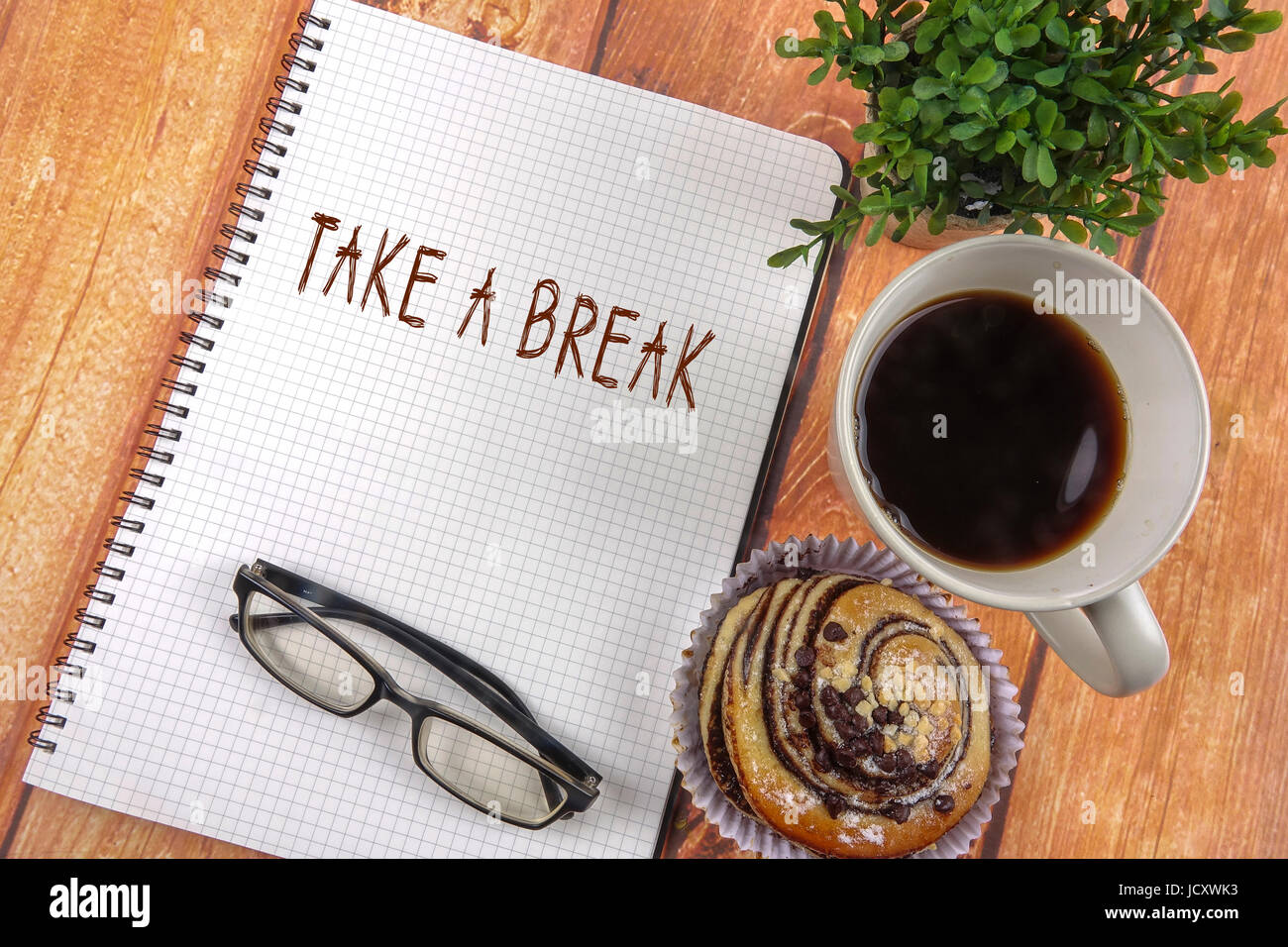 Business concept of simple breakfast, coffee and croissant with note ...